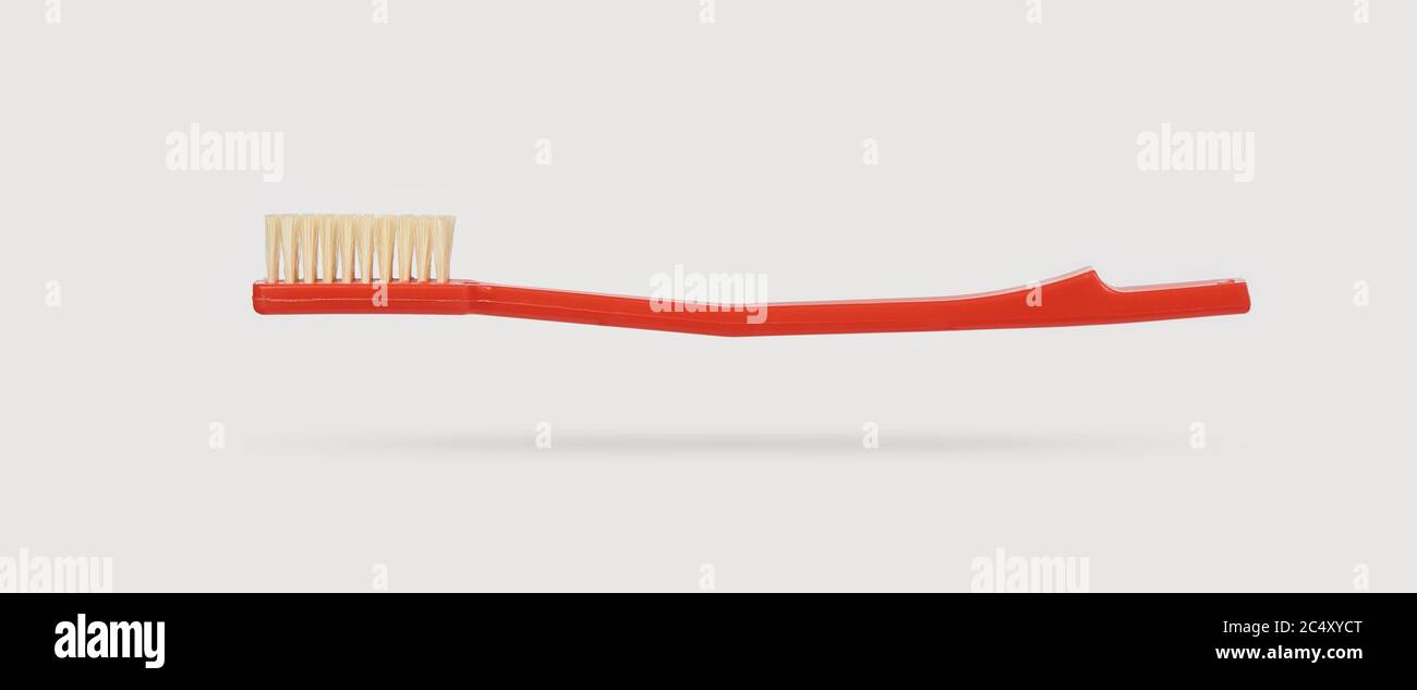 Side view toothbrush red plastic hi-res stock photography and images ...