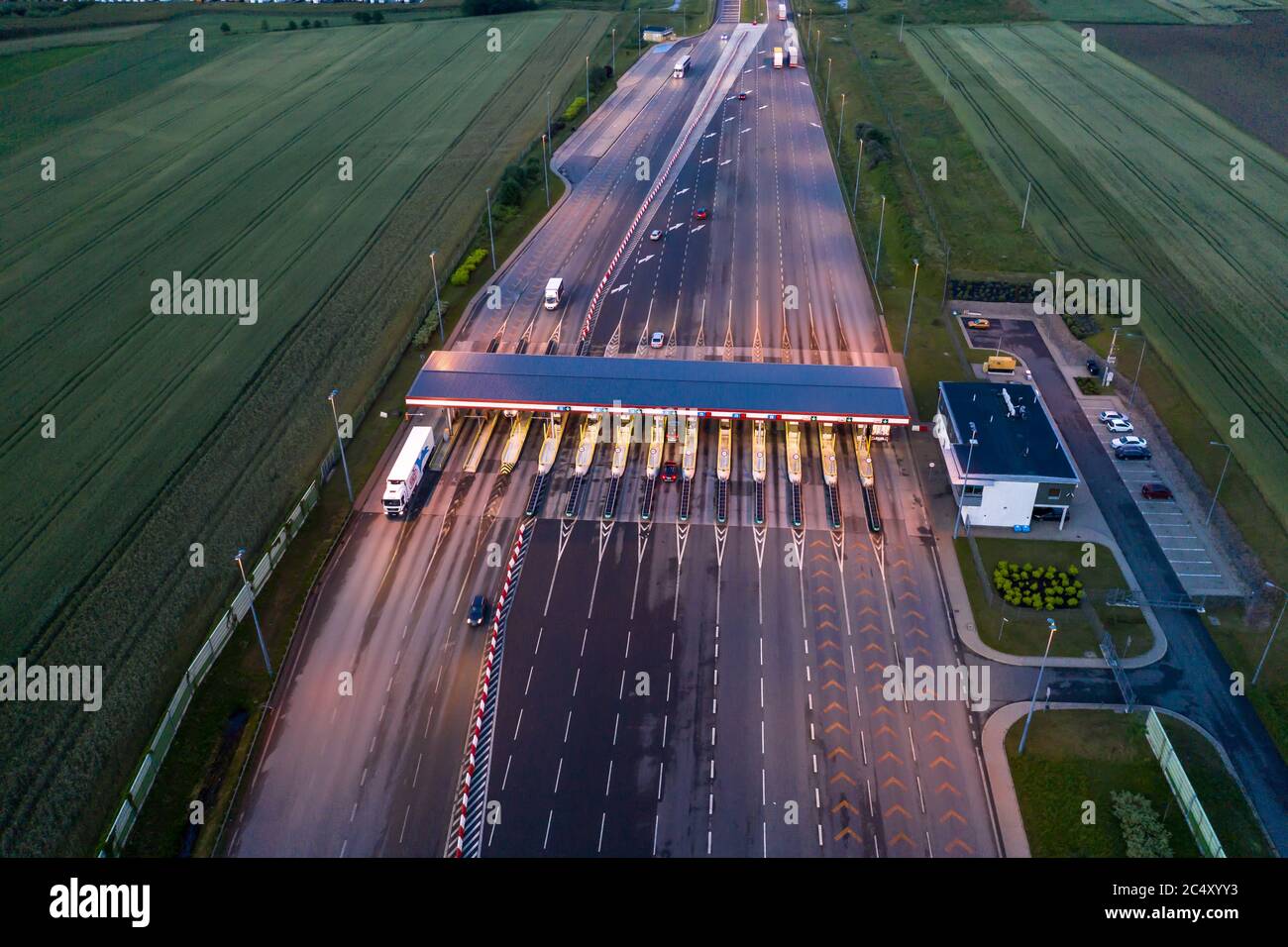 Car traffic transportation on multiple lanes highway road and toll ...