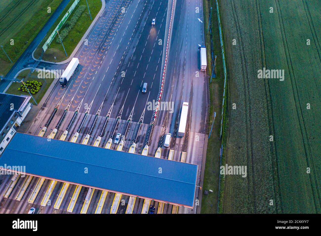 Car traffic transportation on multiple lanes highway road and toll ...