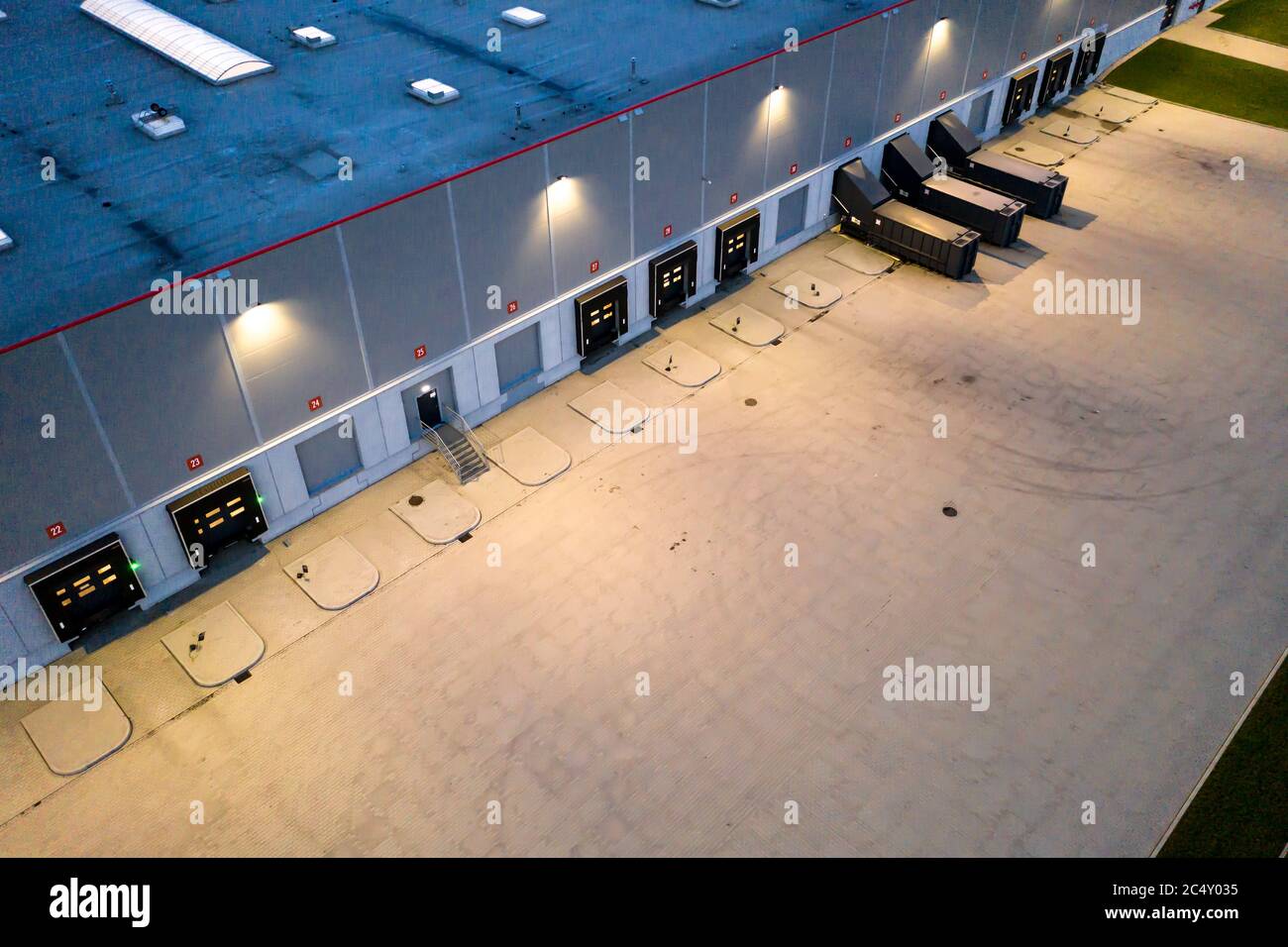Night Aerial view of goods warehouse. Logistics center in industrial ...