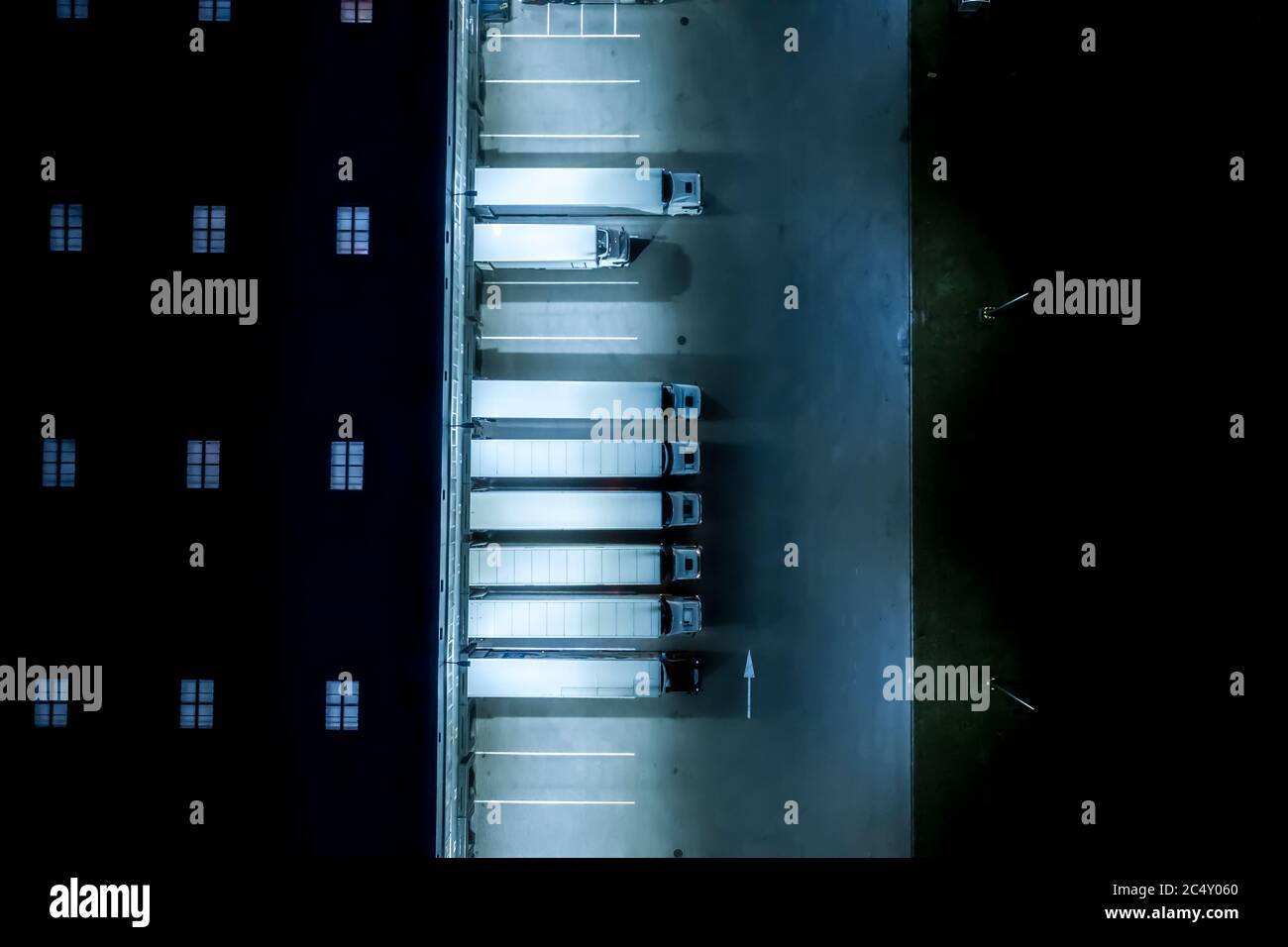Night Loading dock at a warehouse. modern logistics center. docking ...