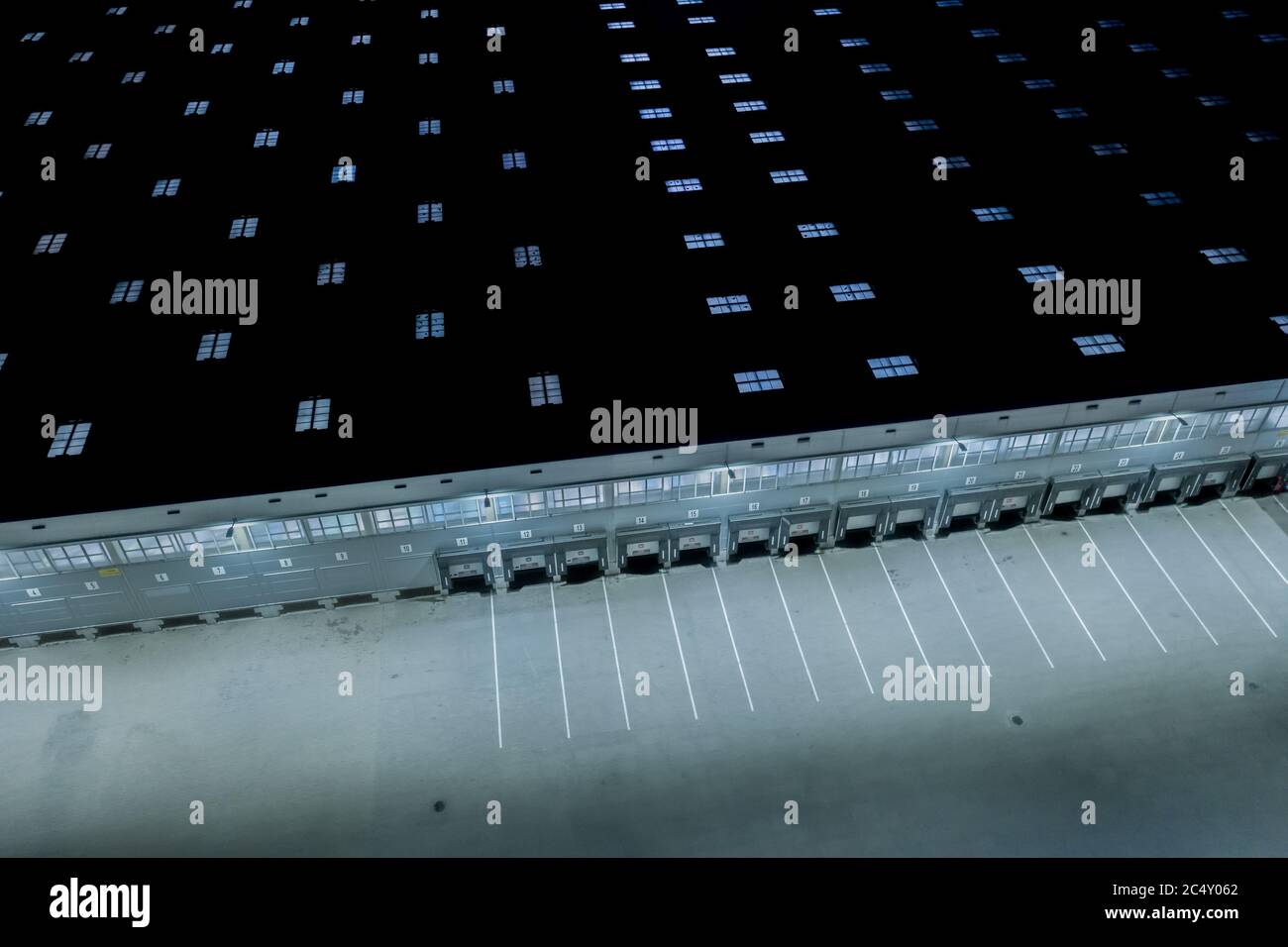 Night Loading dock at a warehouse. modern logistics center. docking ...