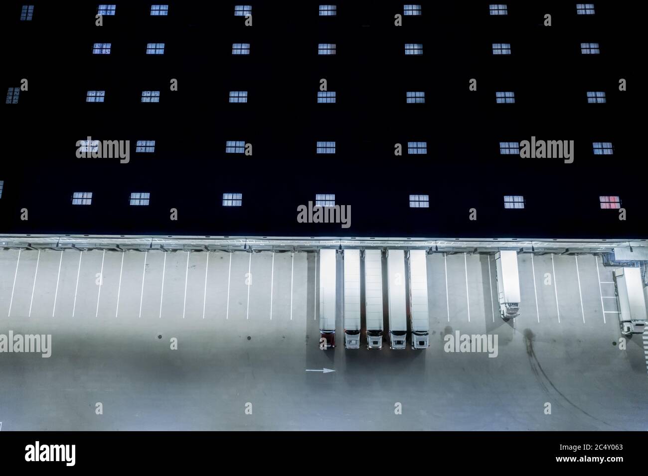 Night Loading dock at a warehouse. modern logistics center. docking ...