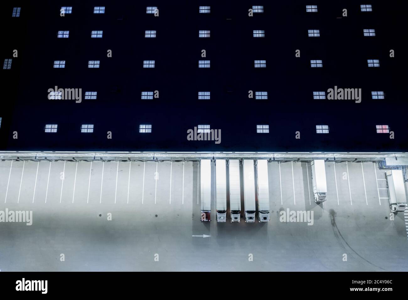 Night Loading dock at a warehouse. modern logistics center. docking ...