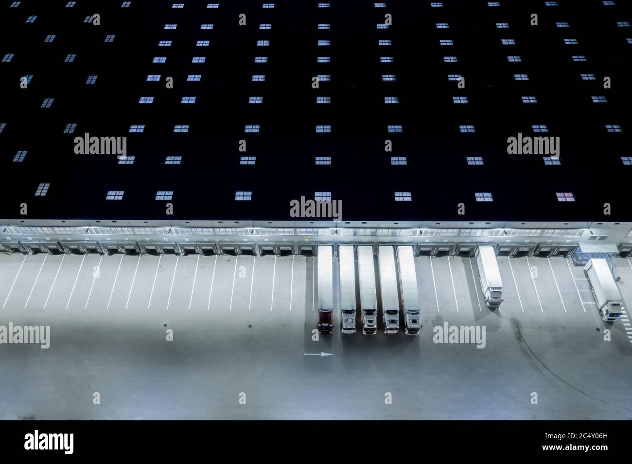 Night Loading dock at a warehouse. modern logistics center. docking ...