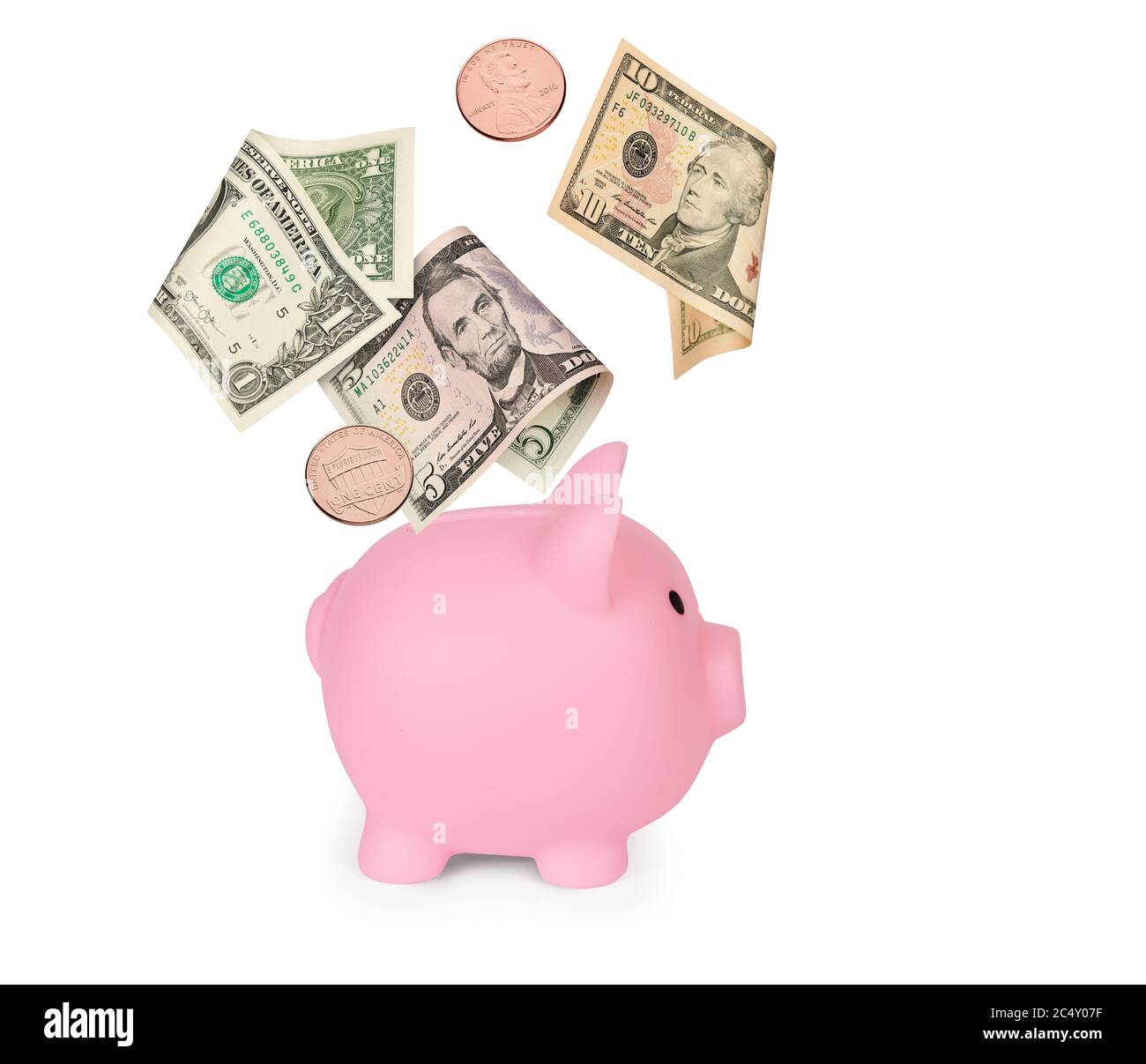 Piggy bank with US dollars isolated on white background Stock Photo - Alamy
