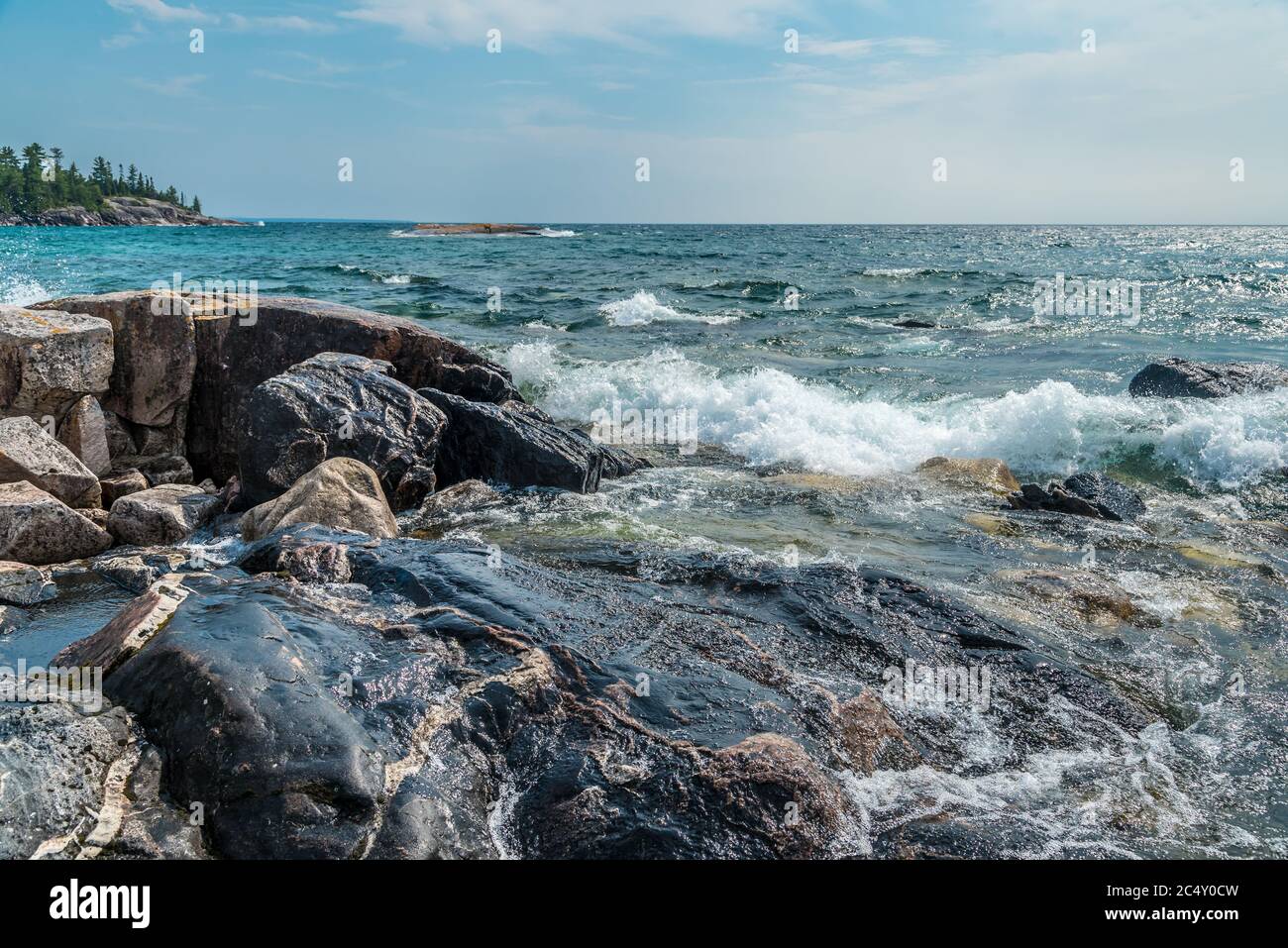 Surf at rocky promontory in Superior Lake Park. Canada Stock Photo - Alamy