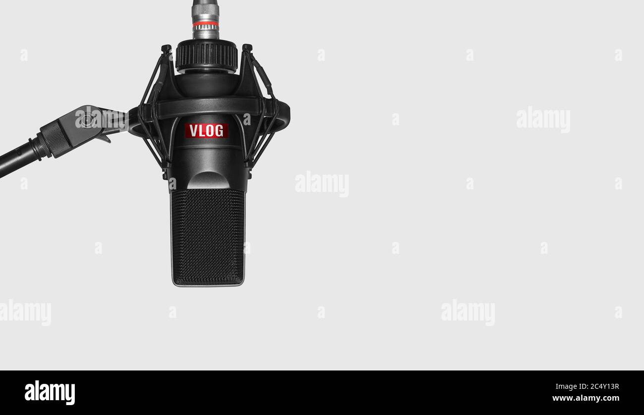 high fidelity microphone hanging on holder isolated on white background ...