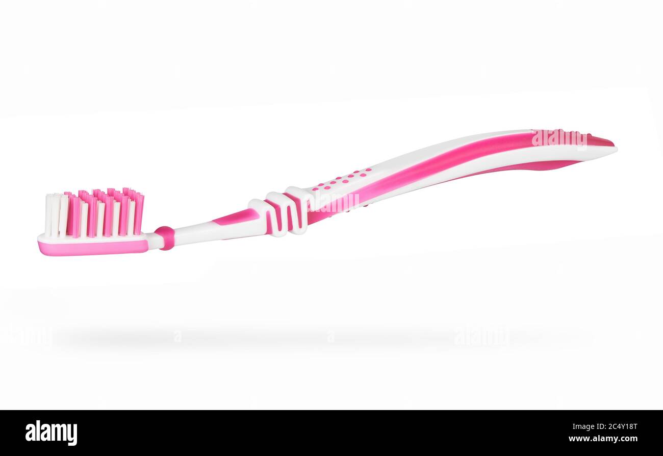pink toothbrush isolated on white background with clipping path Stock ...