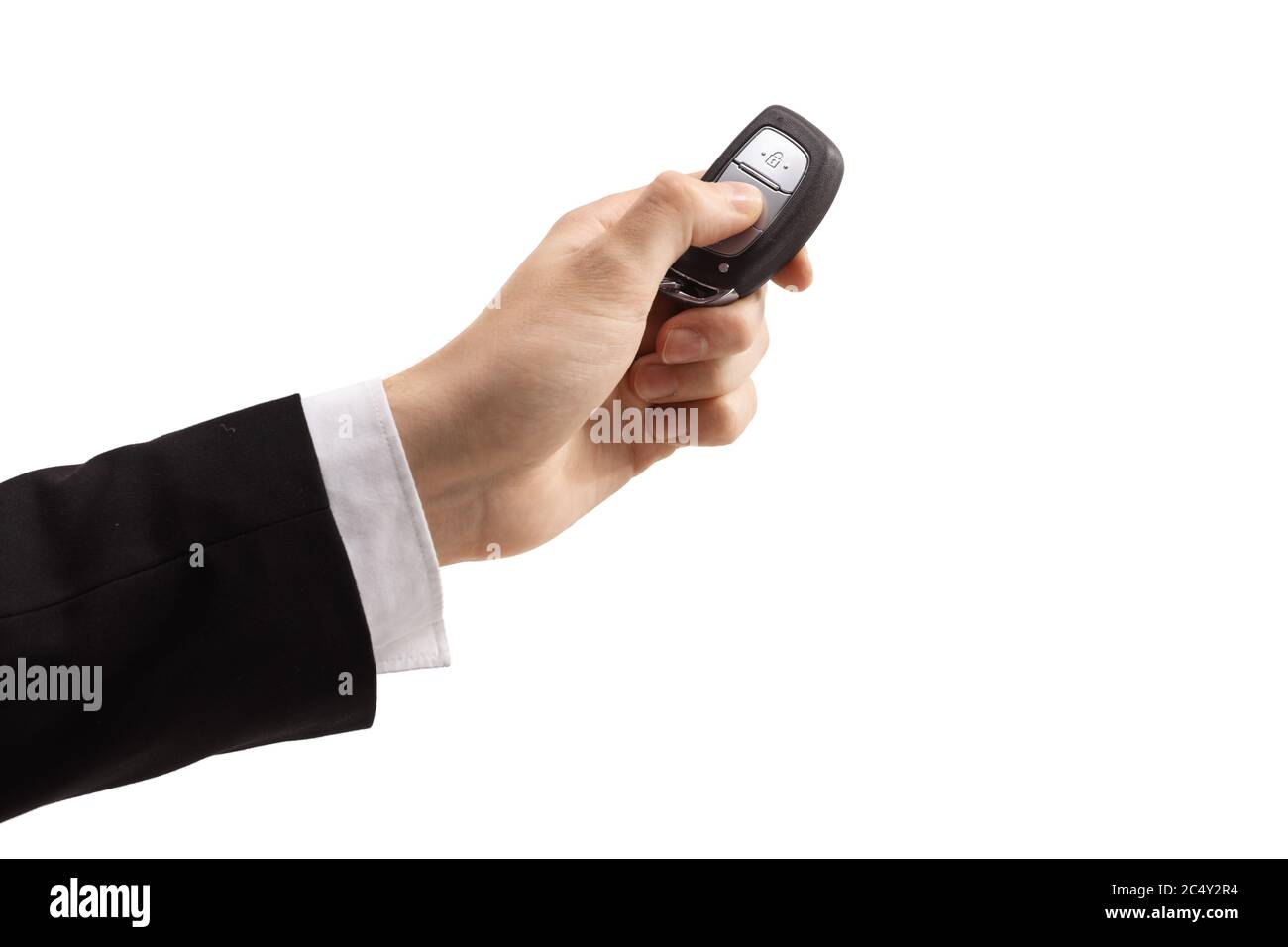 Male hand in a suit pressing a car key isolated on white background ...
