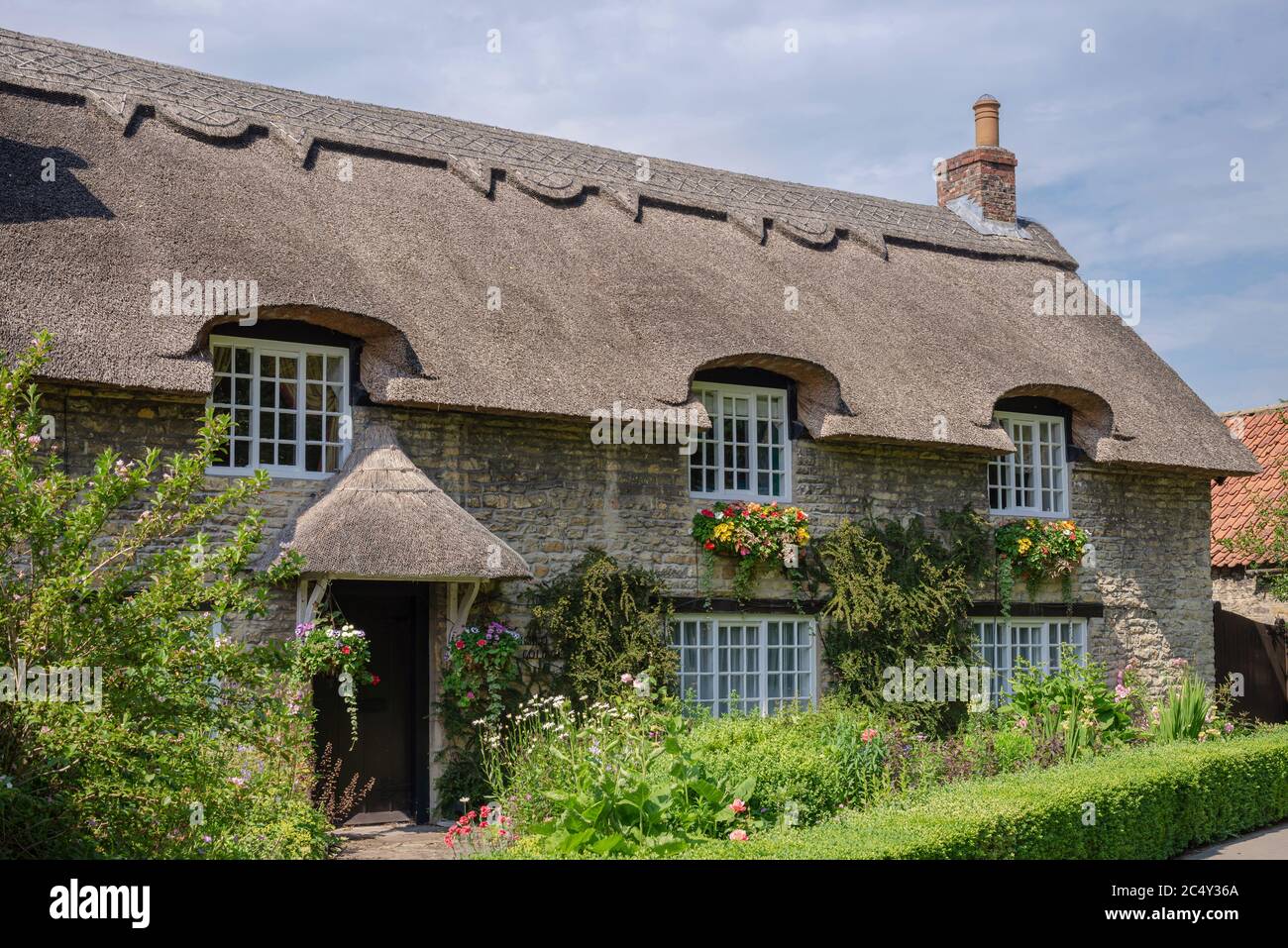 Stone-built picturesque thatched cottage in Thornton-le-Dale, North ...