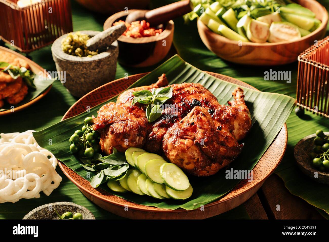 Ayam Bekakak. Traditional Sundanese char-grilled chicken from West Java ...