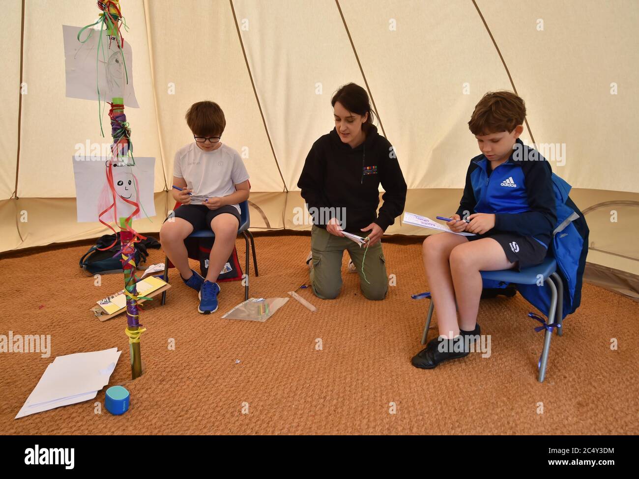 Teacher Holly Haime teaches year five pupils arts and crafts as they ...