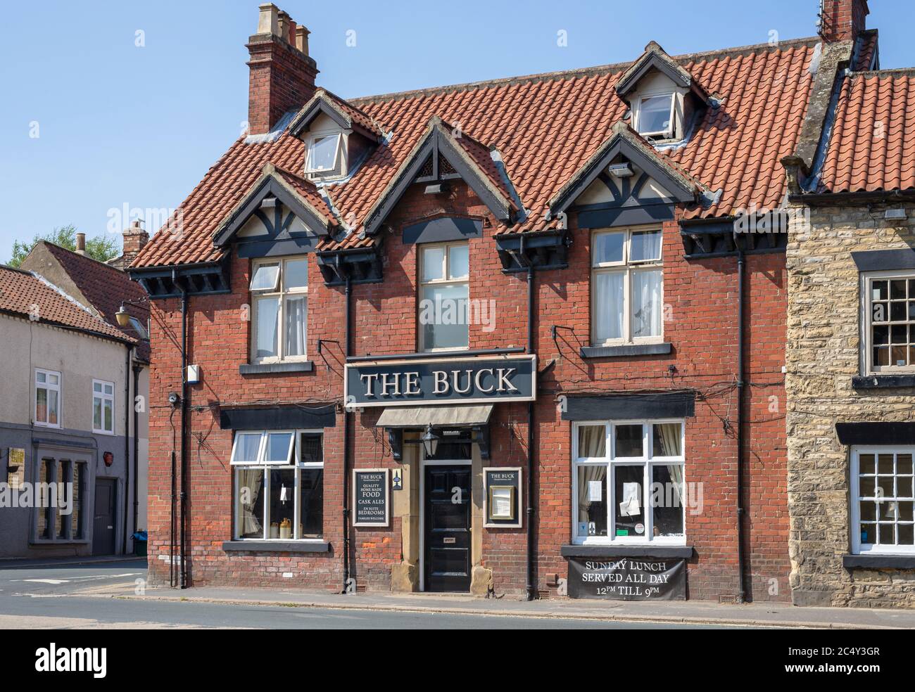 Typical English public house. A re-brick building situated on a corner ...