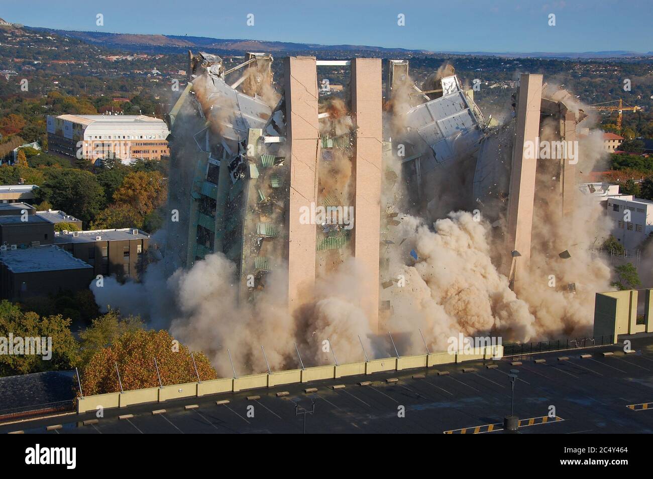 Building demolition by implosion Stock Photo - Alamy