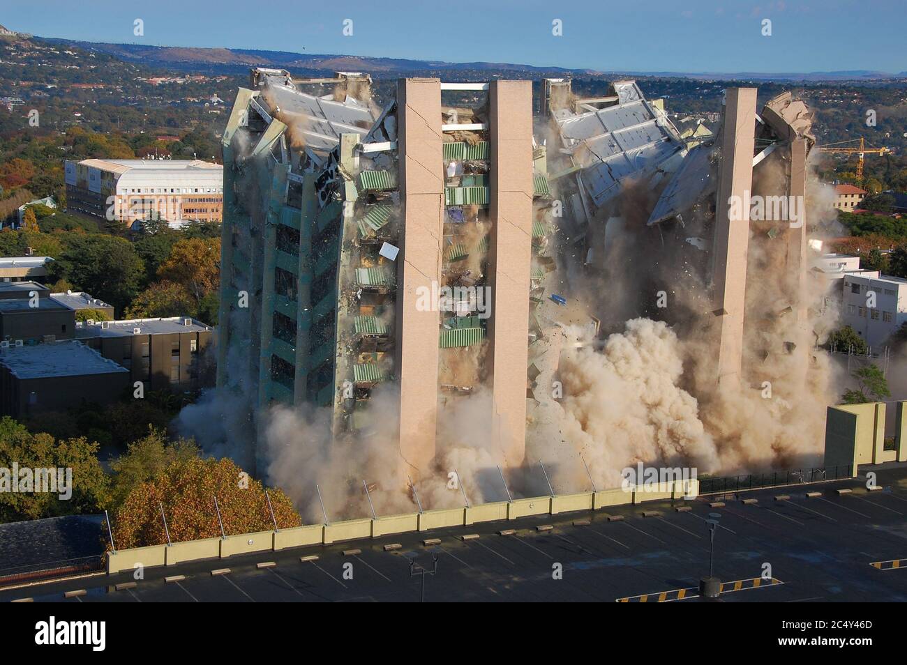 Building demolition by implosion Stock Photo - Alamy