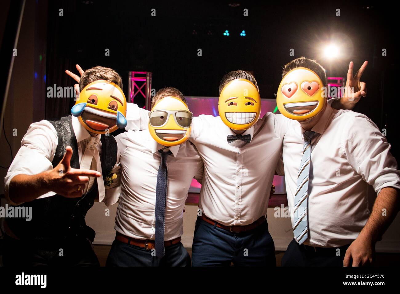 selfie friends group bachelor party men emoji mask Stock Photo - Alamy