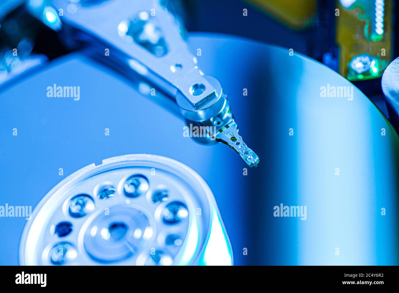 Detail of the inside of a hard disk with the reading head in operation ...