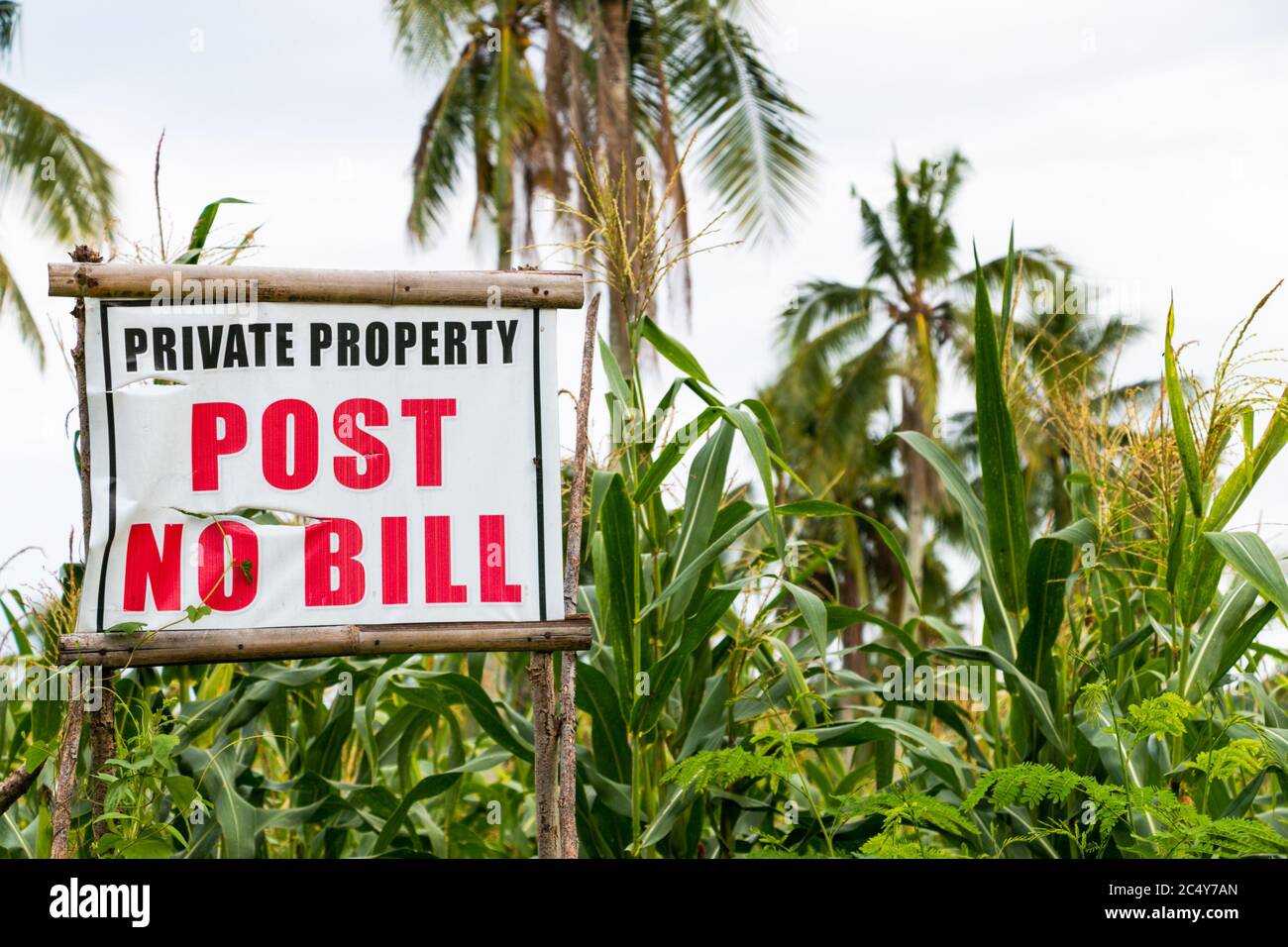 A "post no bill" sign marks private land on Samal Island, Philippines ...