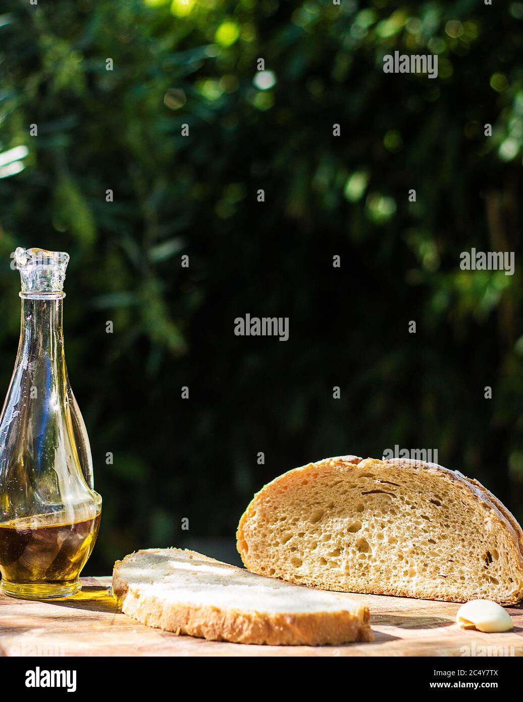 breakfast: oil, bread and garlic Stock Photo - Alamy