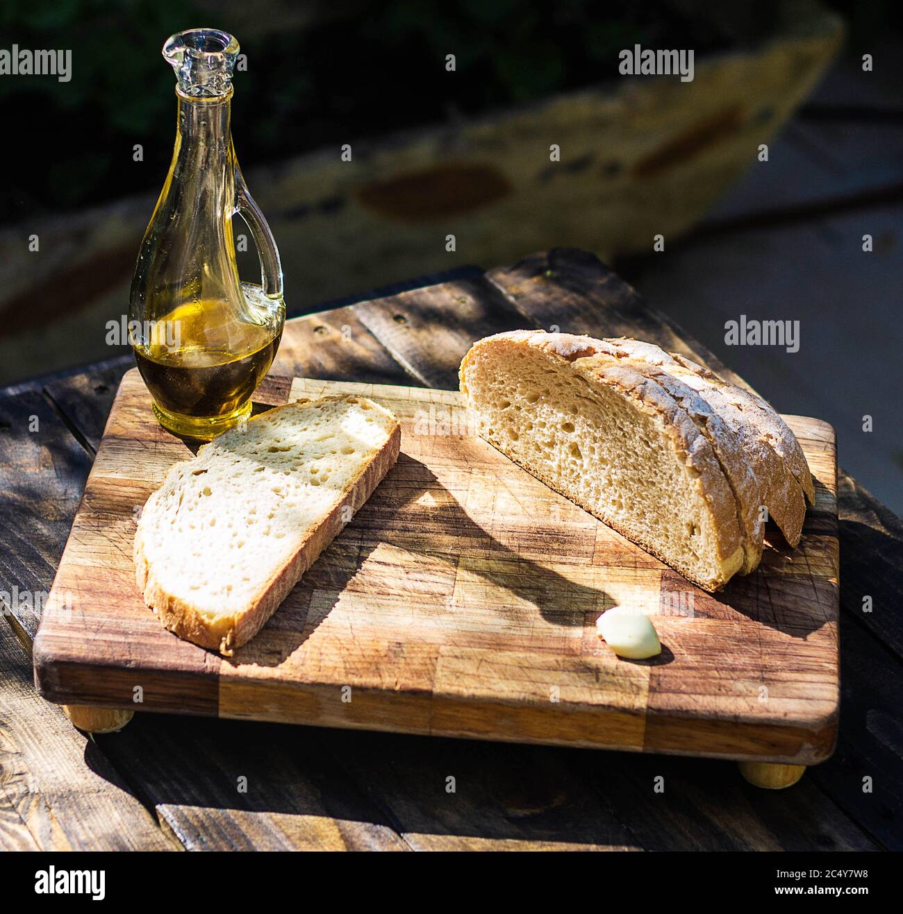 breakfast: oil, bread and garlic Stock Photo - Alamy