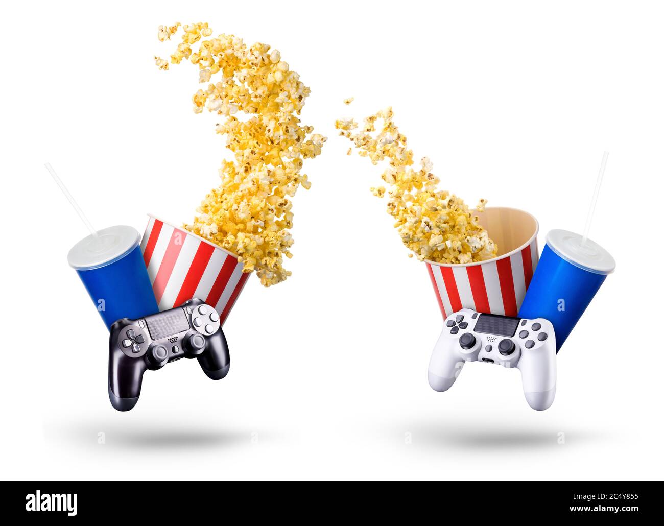 Paper bucket with popcorn, cup of drink and video game joystick on ...