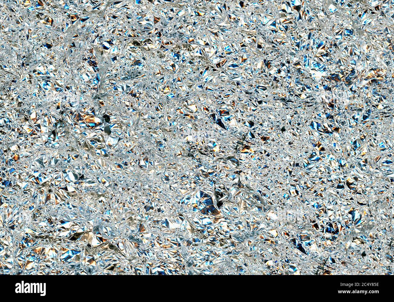 grey aluminium foil texture useful as a background, with color light ...