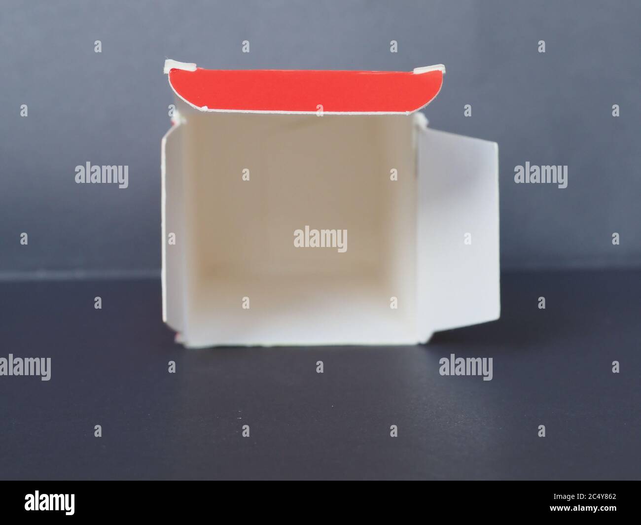 empty cardboard box packet with lid open Stock Photo - Alamy