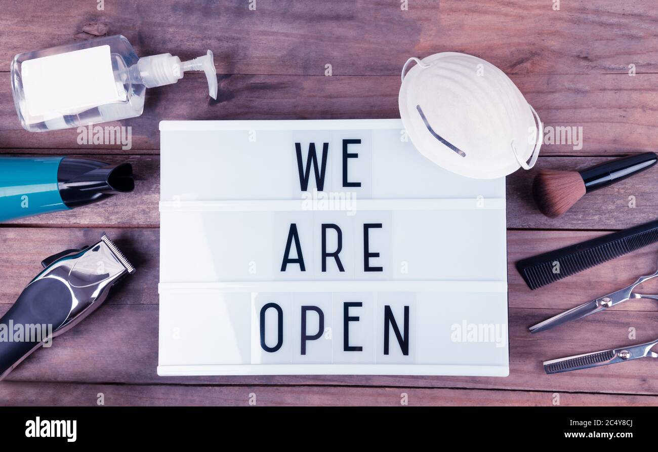 "We're Open" sign for barber shop and hair salon , after quarantine; on ...