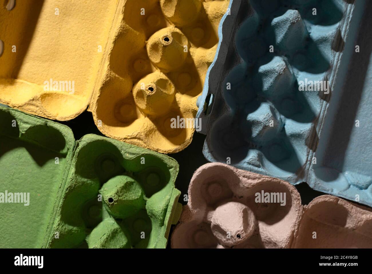 Colored trays from eggs. Garbage collection for recycling concept Stock Photo - Alamy