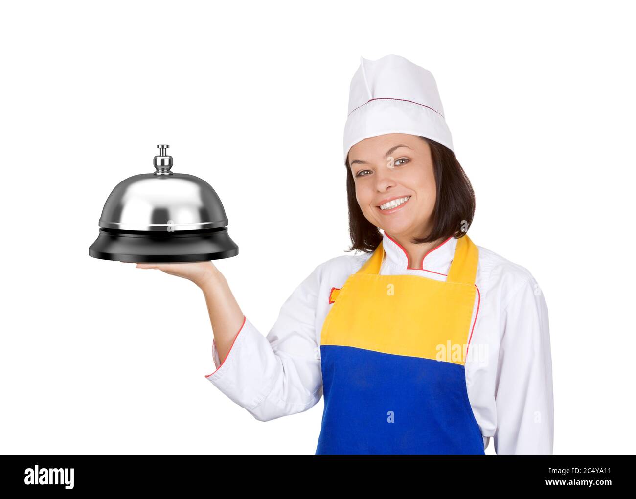 Beautiful Young Woman Chef with Big Service Bell on a white background ...