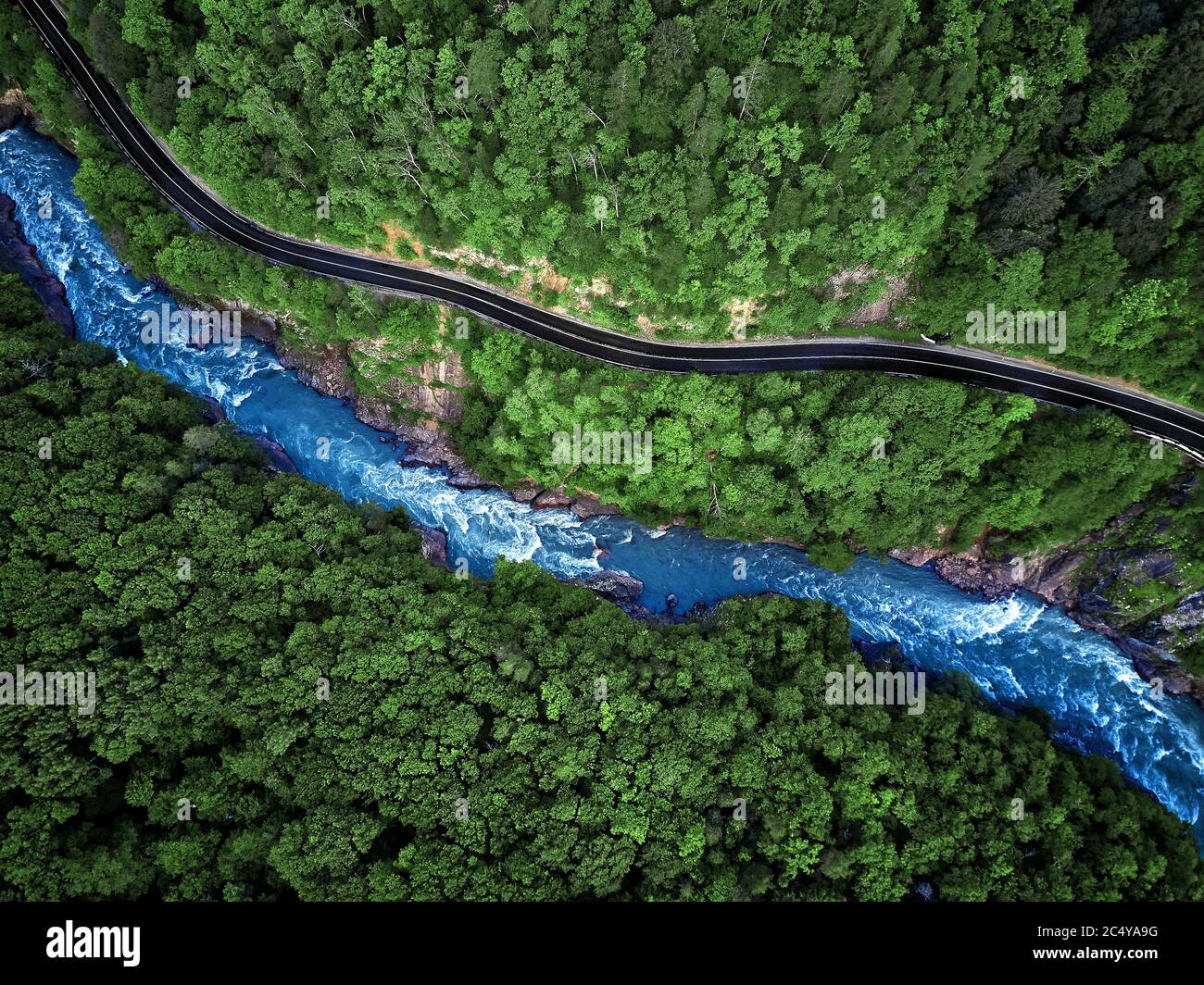 Mountain river and road aerial view. nature, top view Stock Photo - Alamy