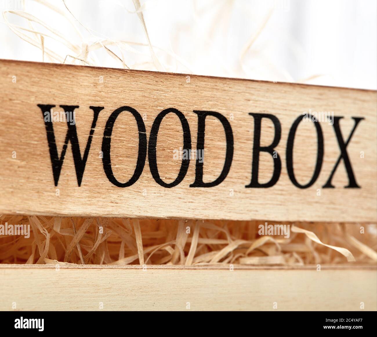 Wooden box with straw. universal packaging. rustic style Stock Photo ...