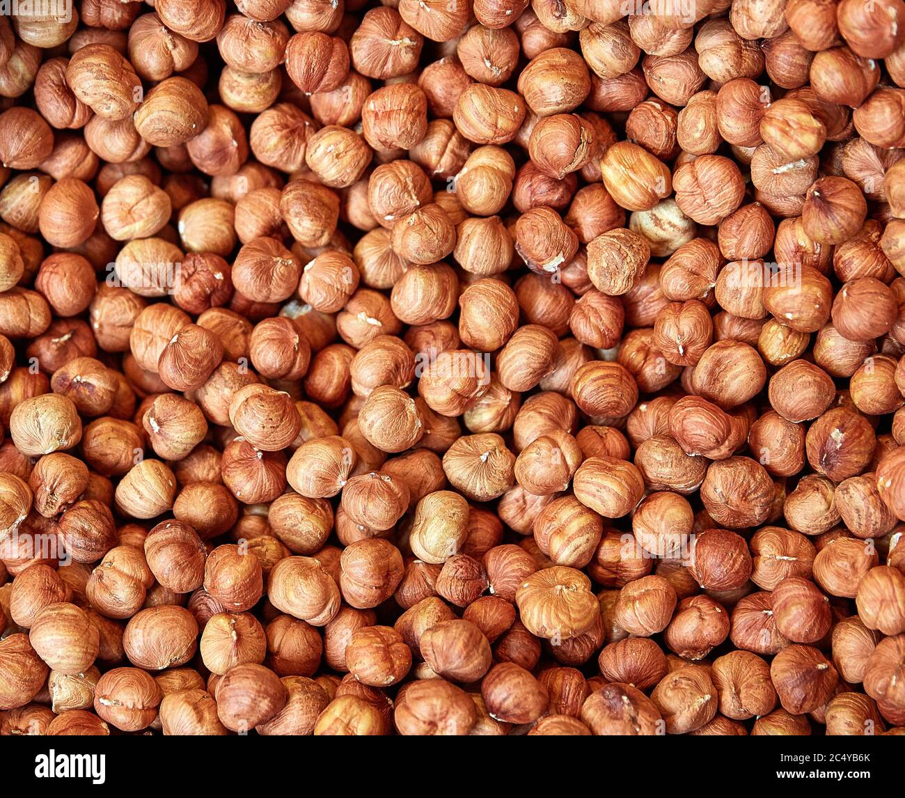 Hazelnut Background. Heap of peeled hazelnuts. products in the Eastern ...