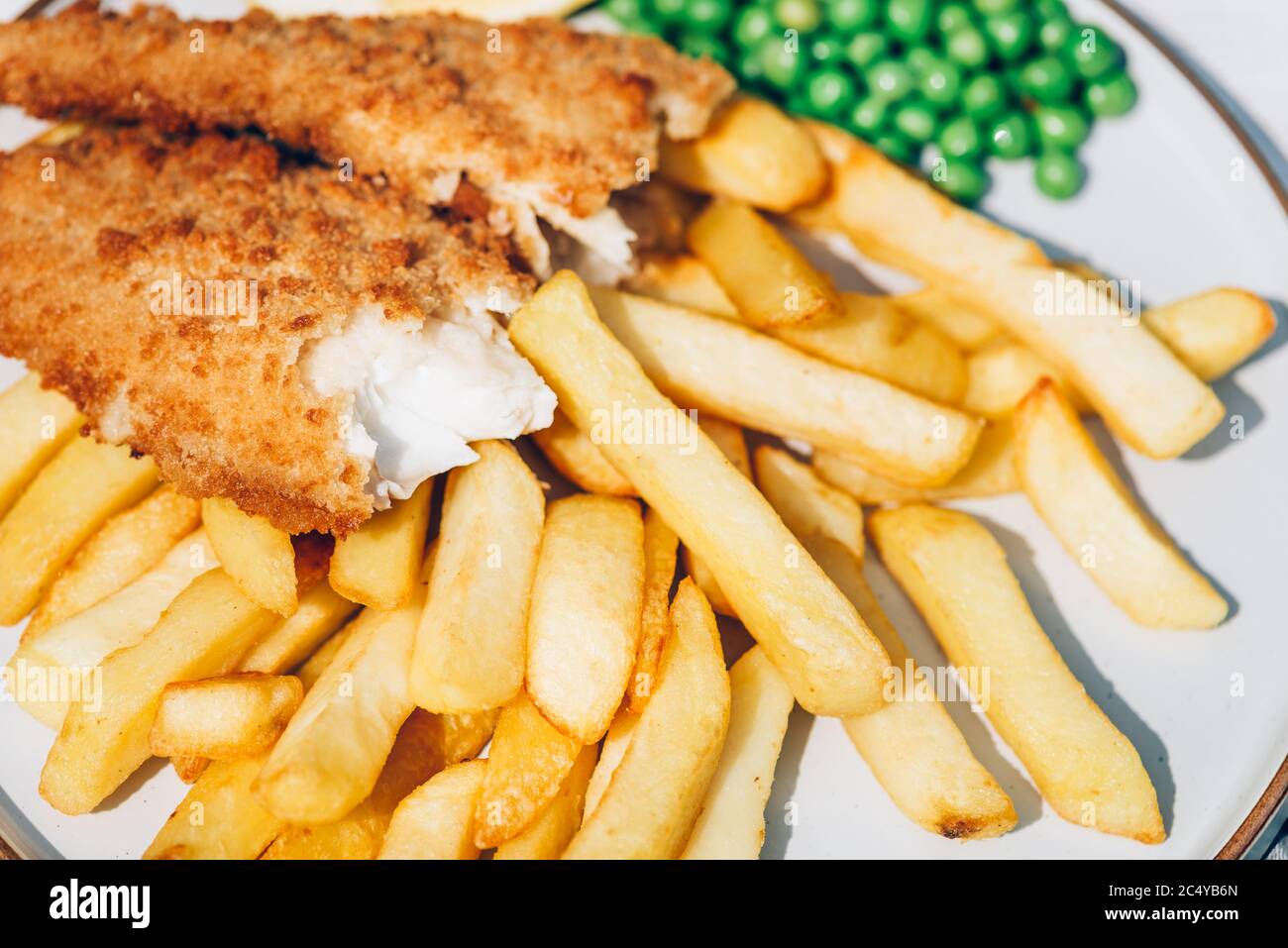 Fish and Chips with peas Stock Photo - Alamy