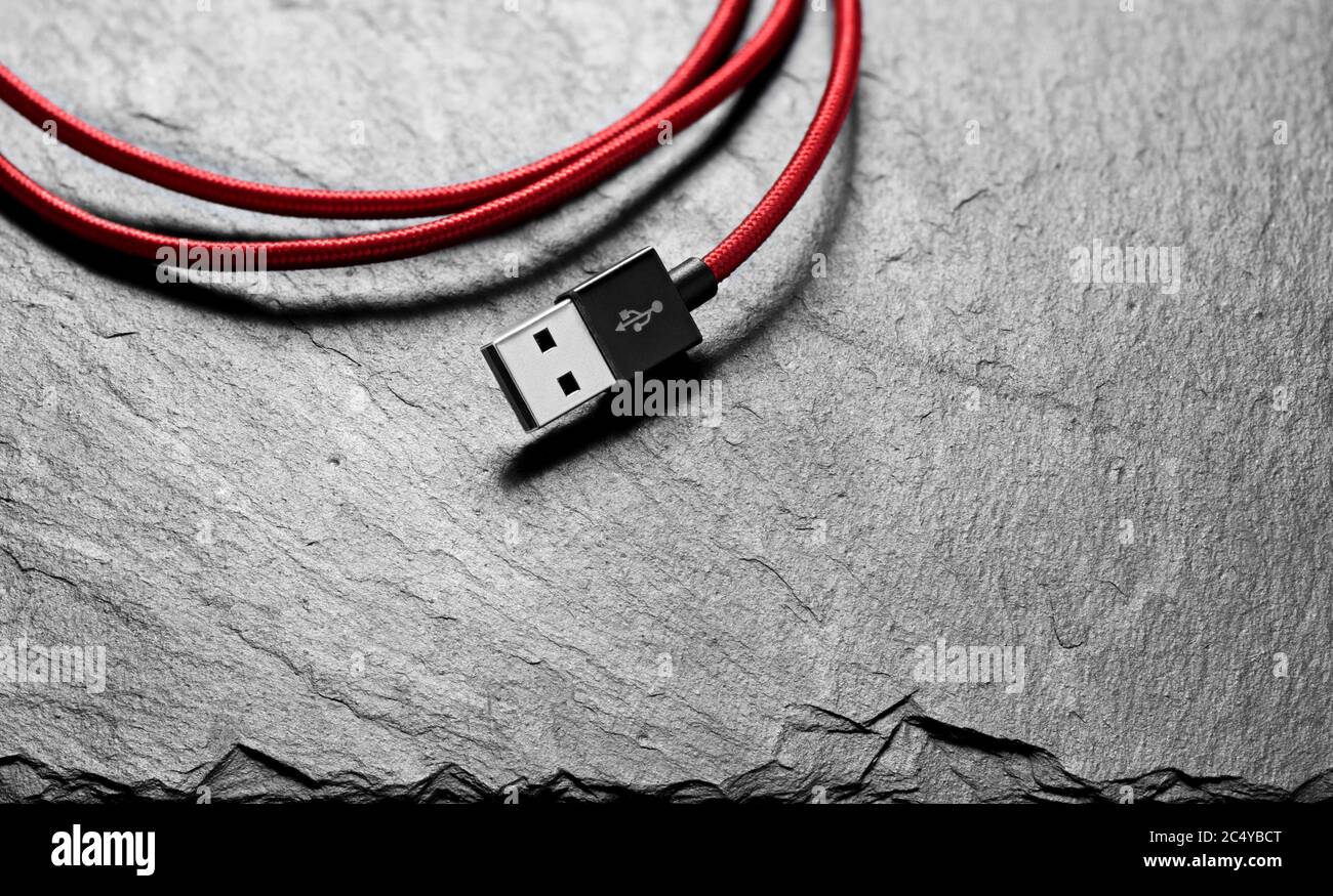 close up of an USB Cable Plug on stone Background Stock Photo - Alamy