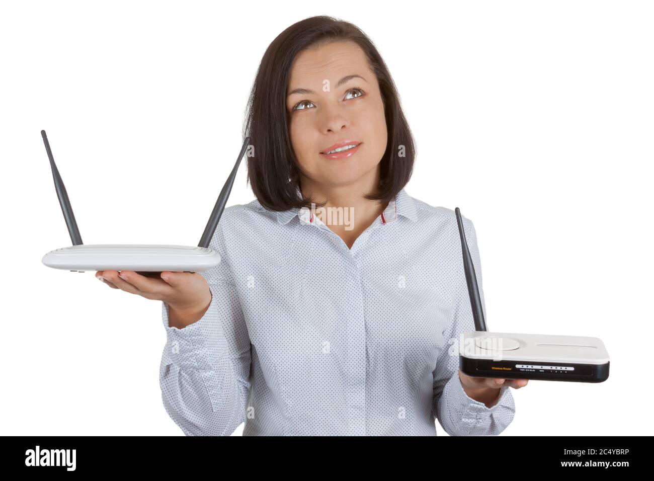 Beautiful Young Woman Choosing Between Two Wireless Modem Routers ...