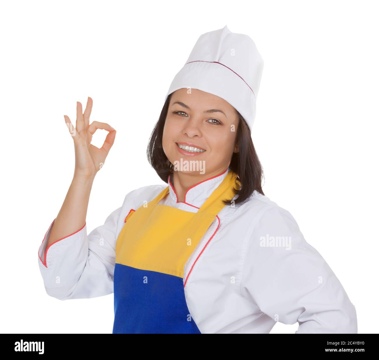Beautiful Young Woman Chef Showing Okay Sign on a white background ...