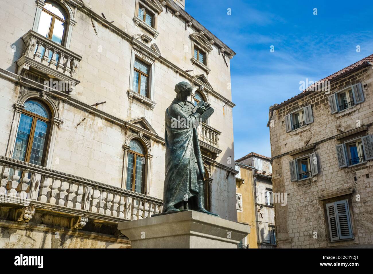Stone statue dedicated to Croatian poet Marko Marulic in the Fruit ...