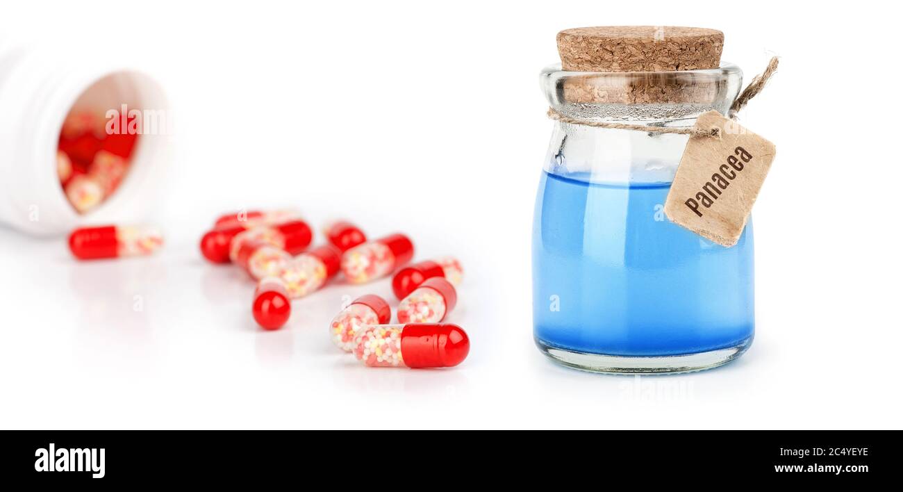 Pills and jar with healing potion panacea isolated on white Stock Photo ...