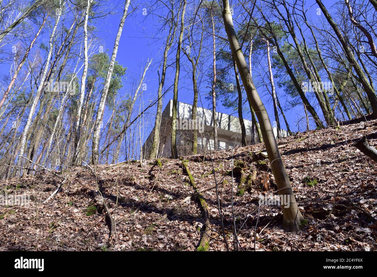 Abandoned and destroyed building. Ruin, danger and danger. Summer day ...