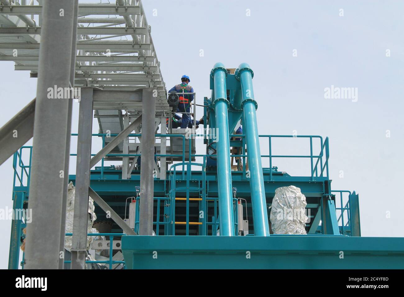 Oil pipes in a petrochemical plant during the production of oil and gas ...