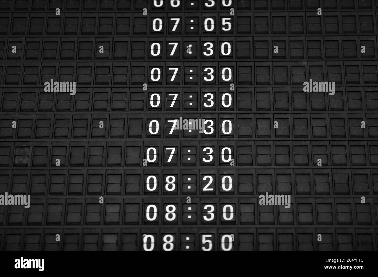 Time boards at the airport. Flight information mechanical timetable ...