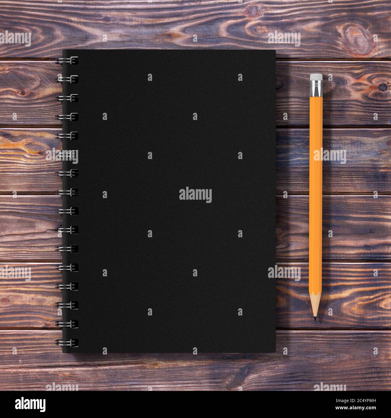 Top View of Black Closed Spiral Paper Cover Notebook with Yellow Pencil ...