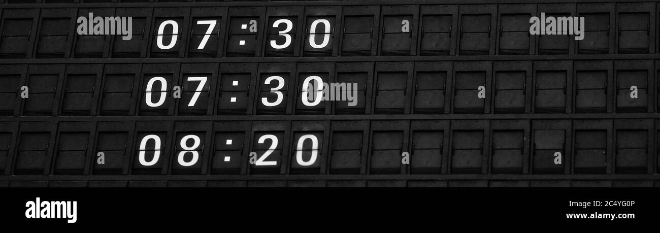 Time boards at the airport. Flight information mechanical timetable ...