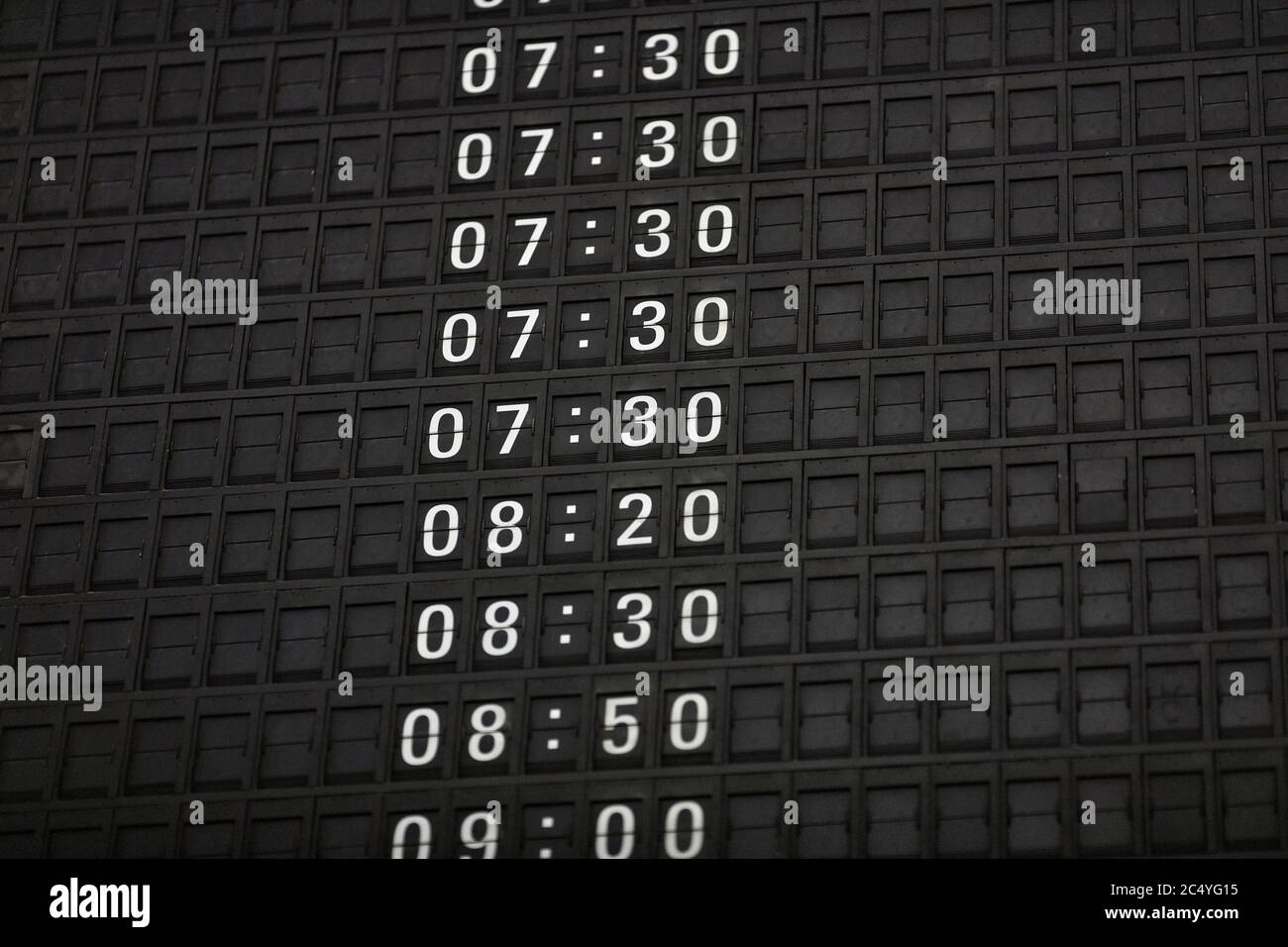 Time boards at the airport. Flight information mechanical timetable ...