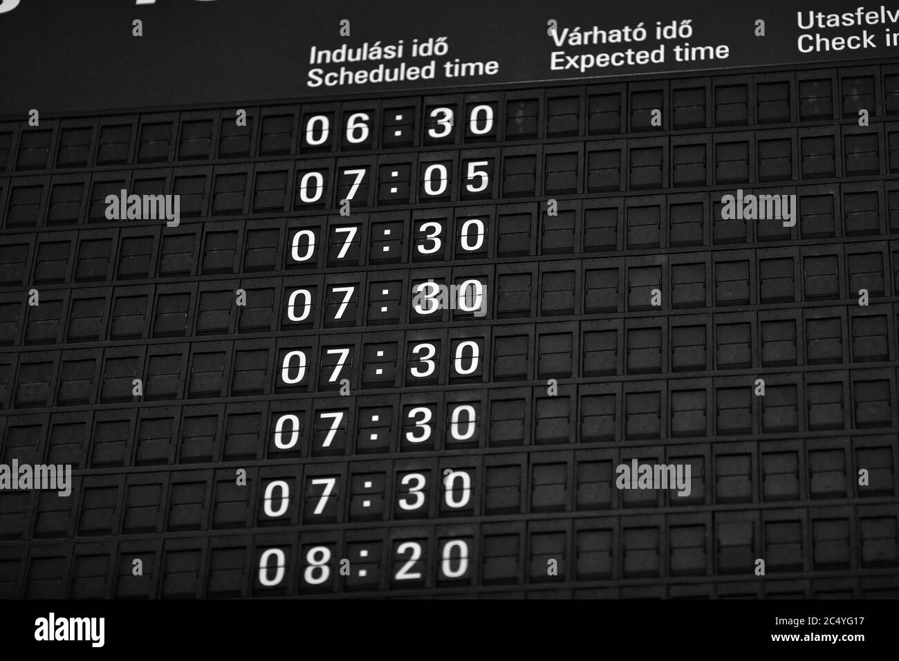 Time boards at the airport. Flight information mechanical timetable ...