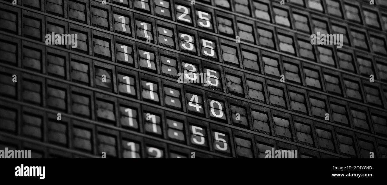 Time boards at the airport. Flight information mechanical timetable ...
