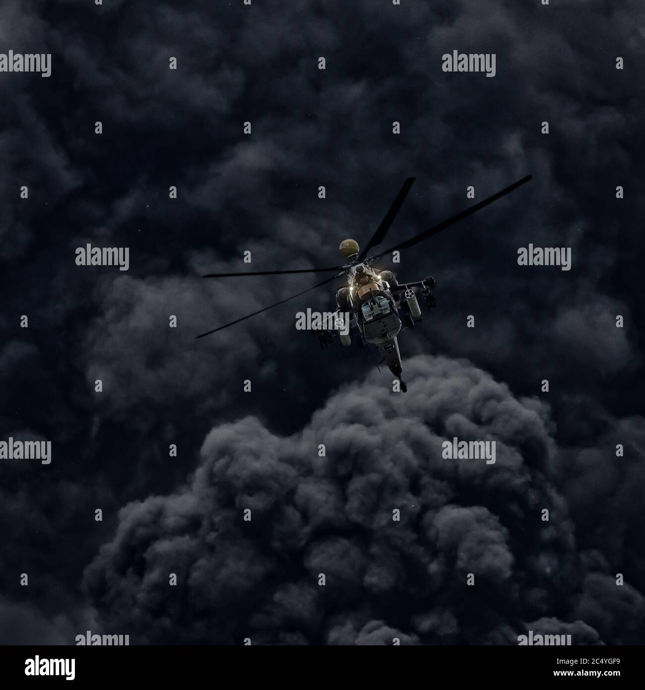 Attack helicopter against the background of smoke. after the mission ...
