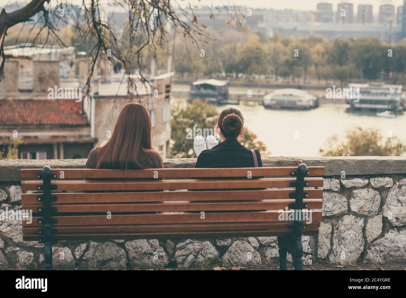 two girls on the bench. Kalemegdan fortess, Belgrade Stock Photo - Alamy